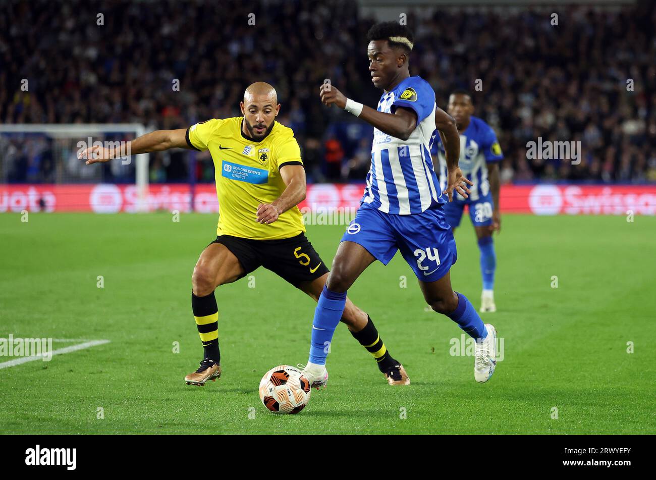 Brighton and Hove Albion's Simon Adingra and AEK Athens' Nordin Amrabat ...