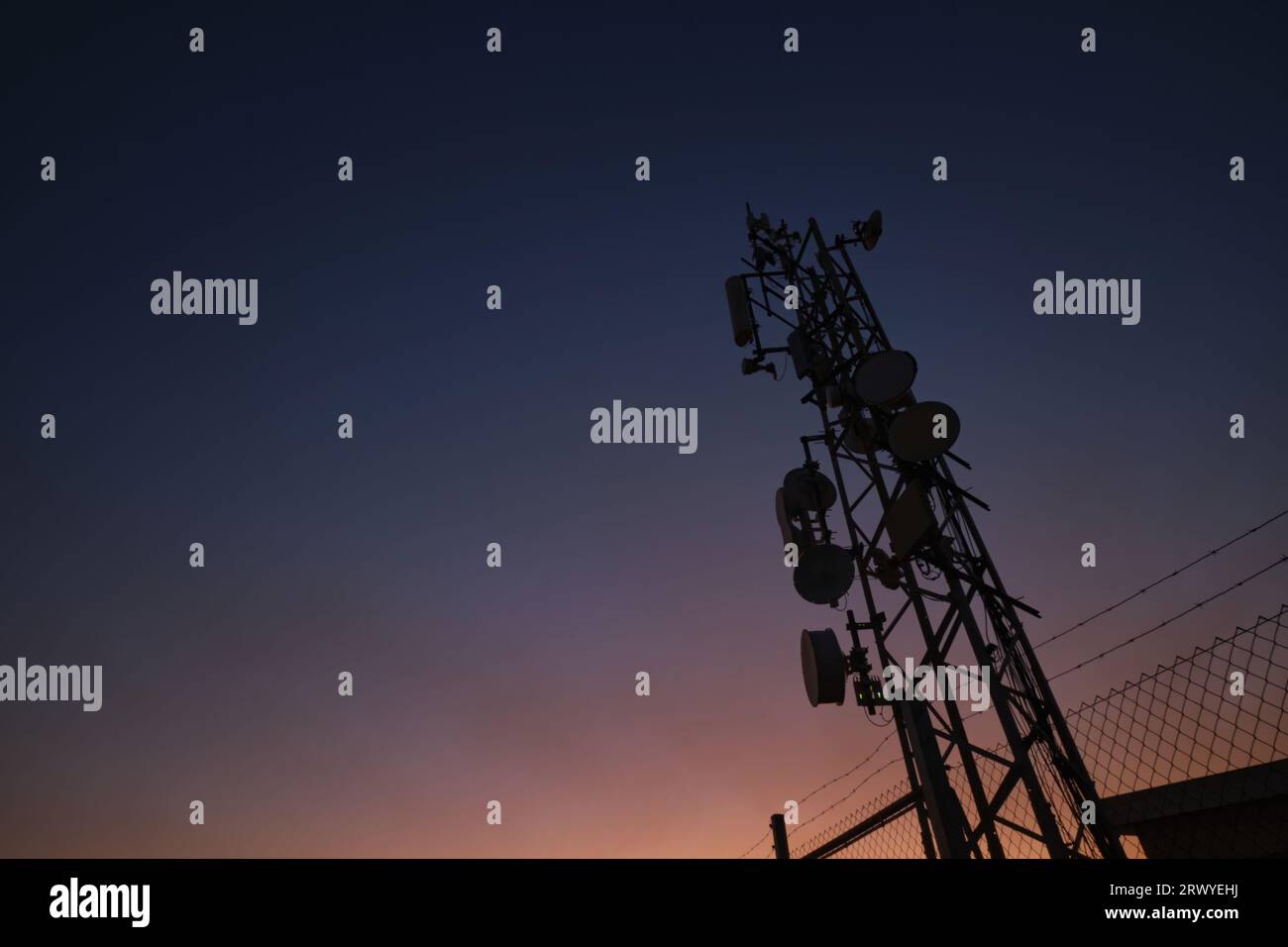 cellular communication antennas on the sky background Stock Photo - Alamy
