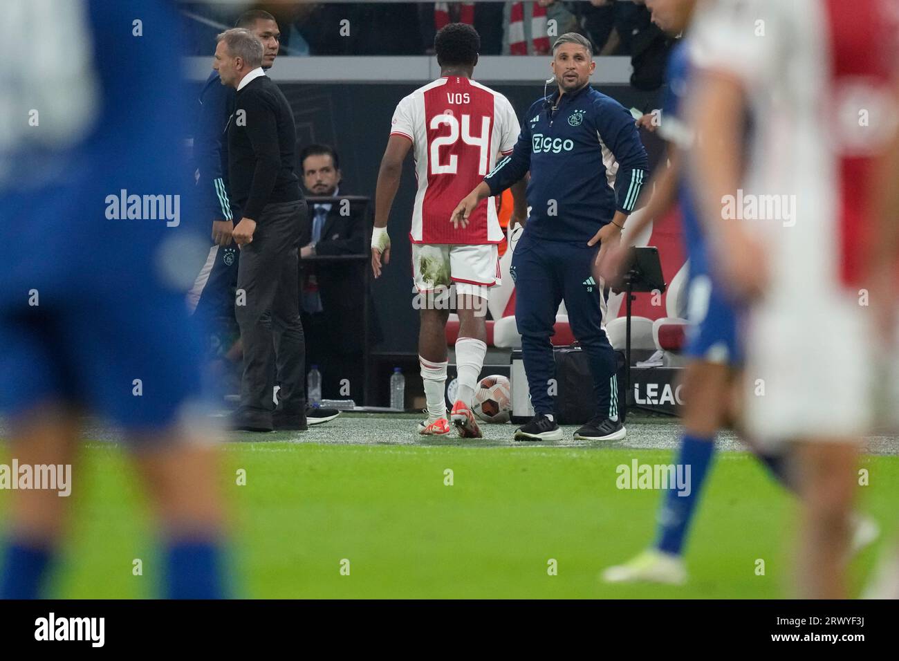 Ajax's Silvano Vos, centre, walks off the field during the Europa ...