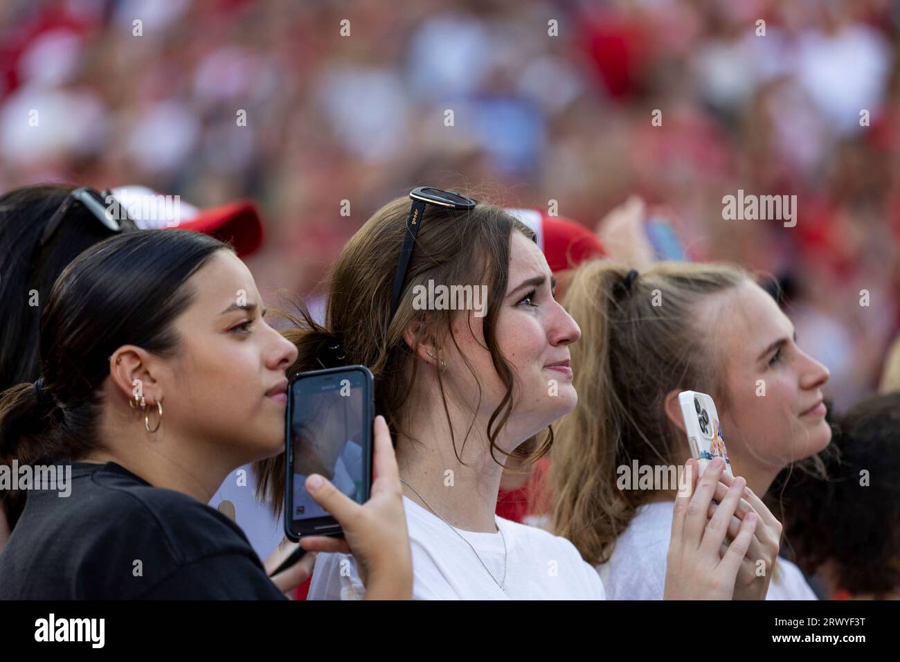 Ashton Koch, center, a Nebraska law student gets emotional during the ...