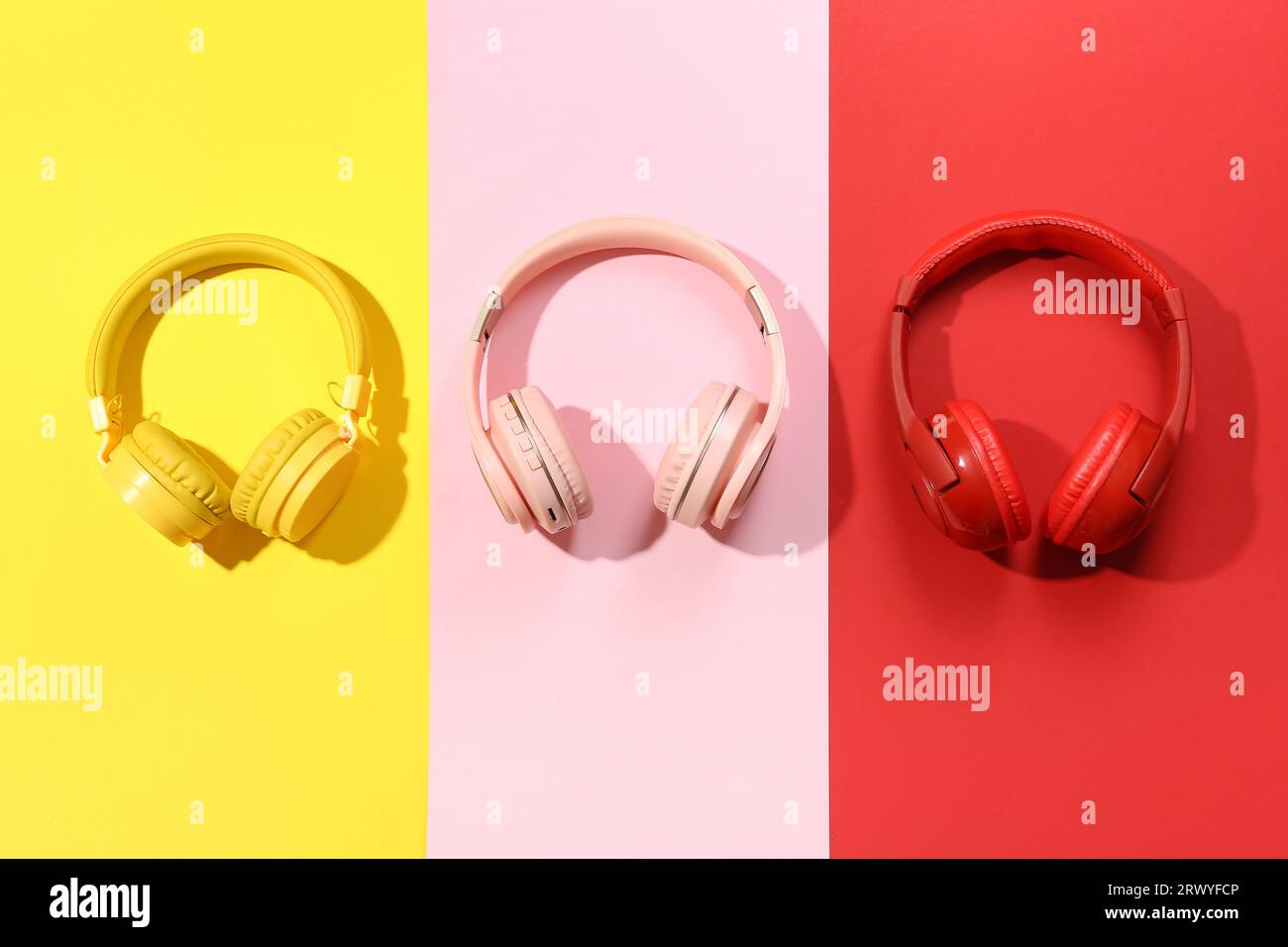 Set of headphones on color background Stock Photo - Alamy