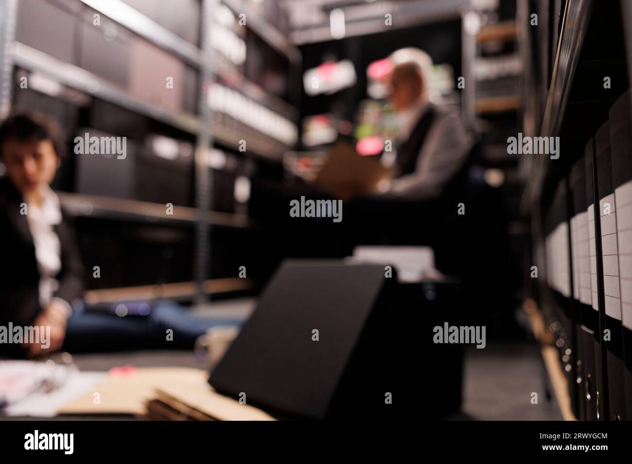 Selectiv focus of storage full with investigation evidence files, in ...