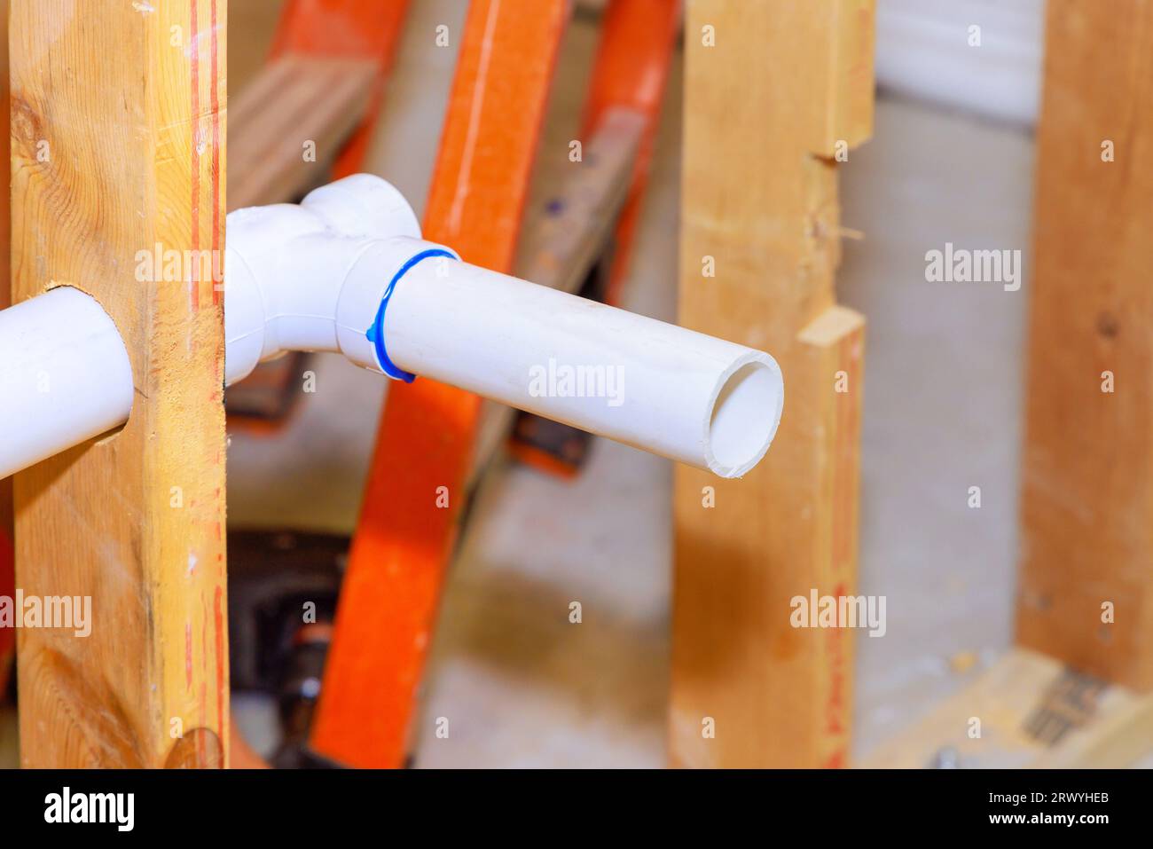 PVC drainage system installation for new house construction Stock Photo ...