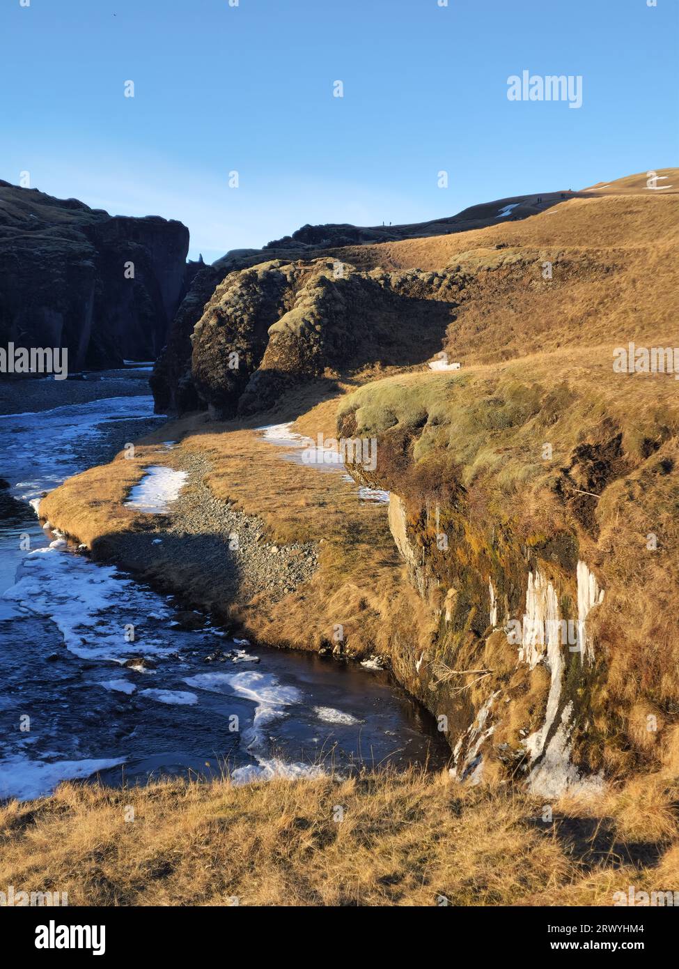 Nordic canyon with river flow and frosty mountains creating amazing ...