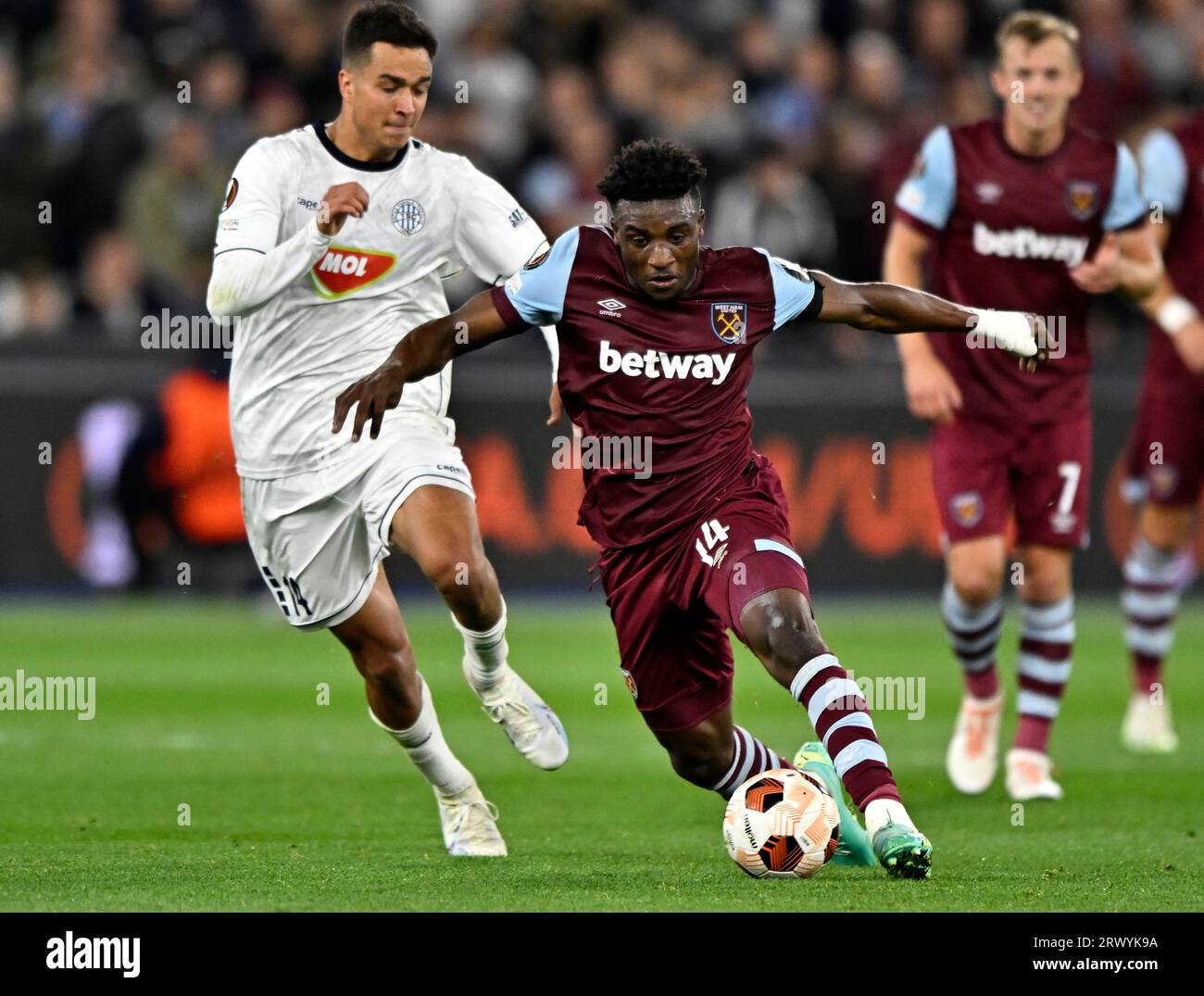 London, UK. 21st Sep, 2023. Mohammed Kudus (West Ham) goes past Petar ...