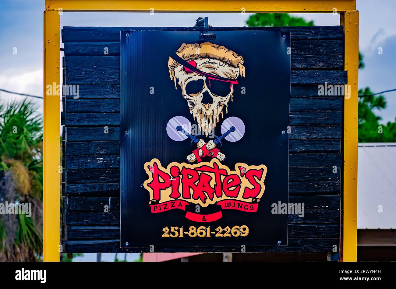 The Pirate’s Pizza & Wings sign features a pirate, Aug. 15, 2023, in ...