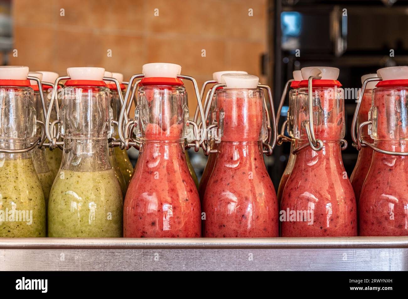Tray with sauce-filled bottles in a restaurant Stock Photo - Alamy