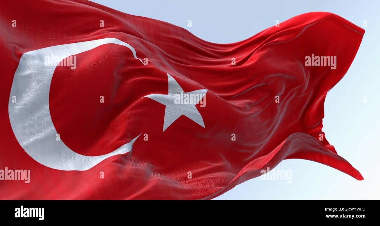 Close-up of Turkey national flag waving in the wind on a clear day. Red ...
