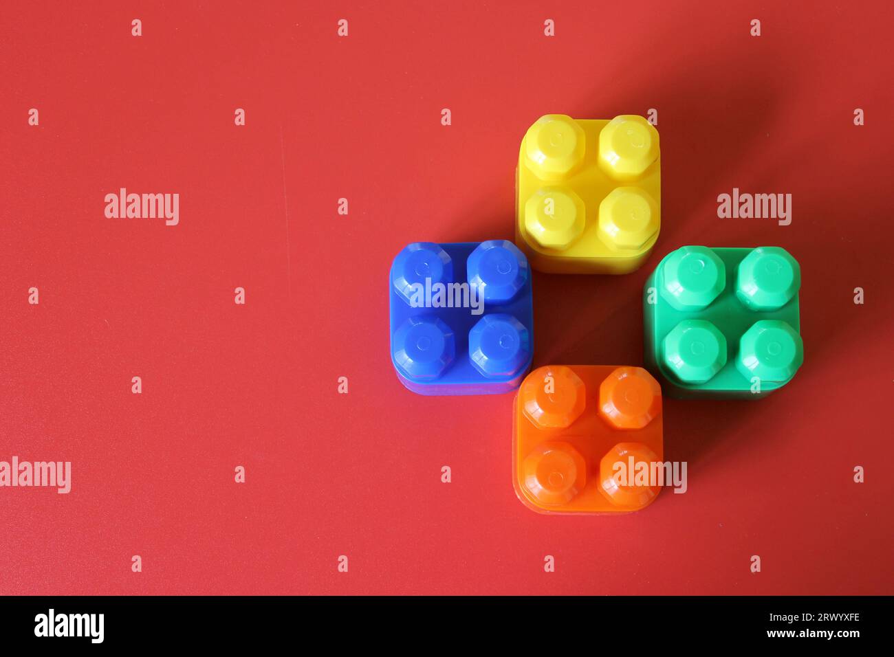 Pieces of plastic rainbow multicolored buildable toy blocks formed and ...