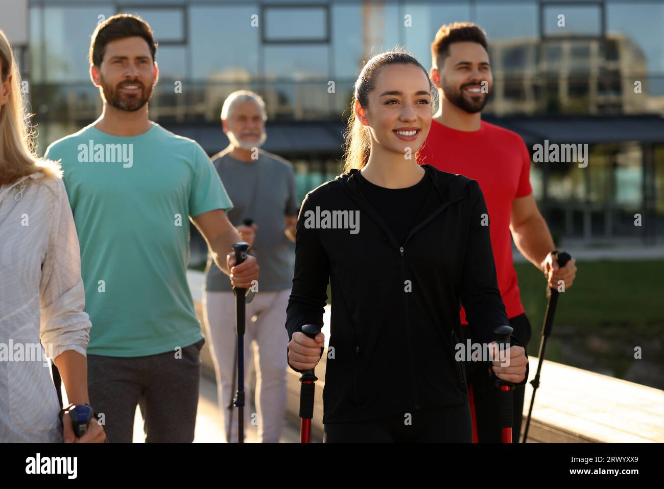 Group people walking poles on hi-res stock photography and images - Alamy