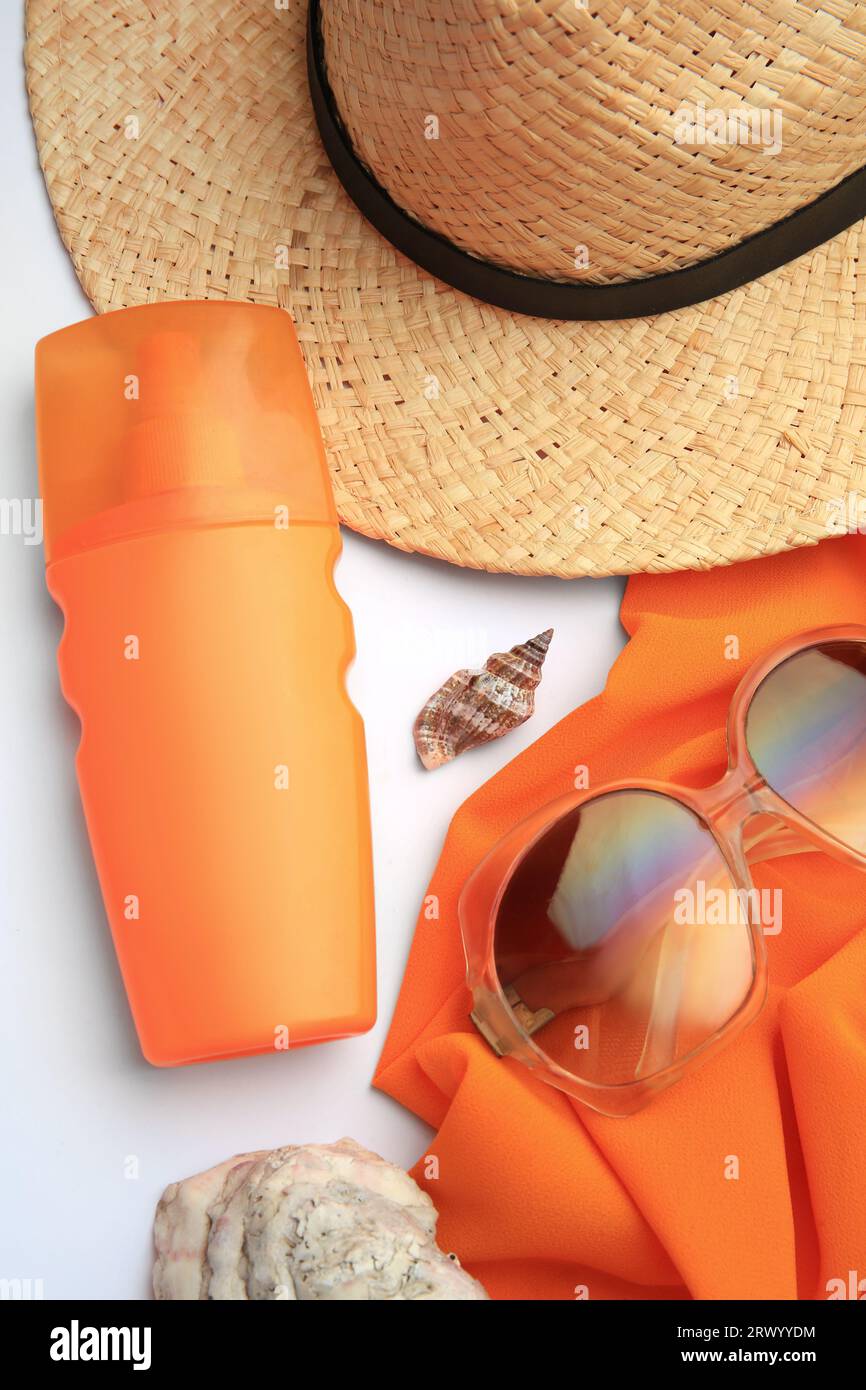 Flat lay composition with bottle of sunscreen on white background Stock ...