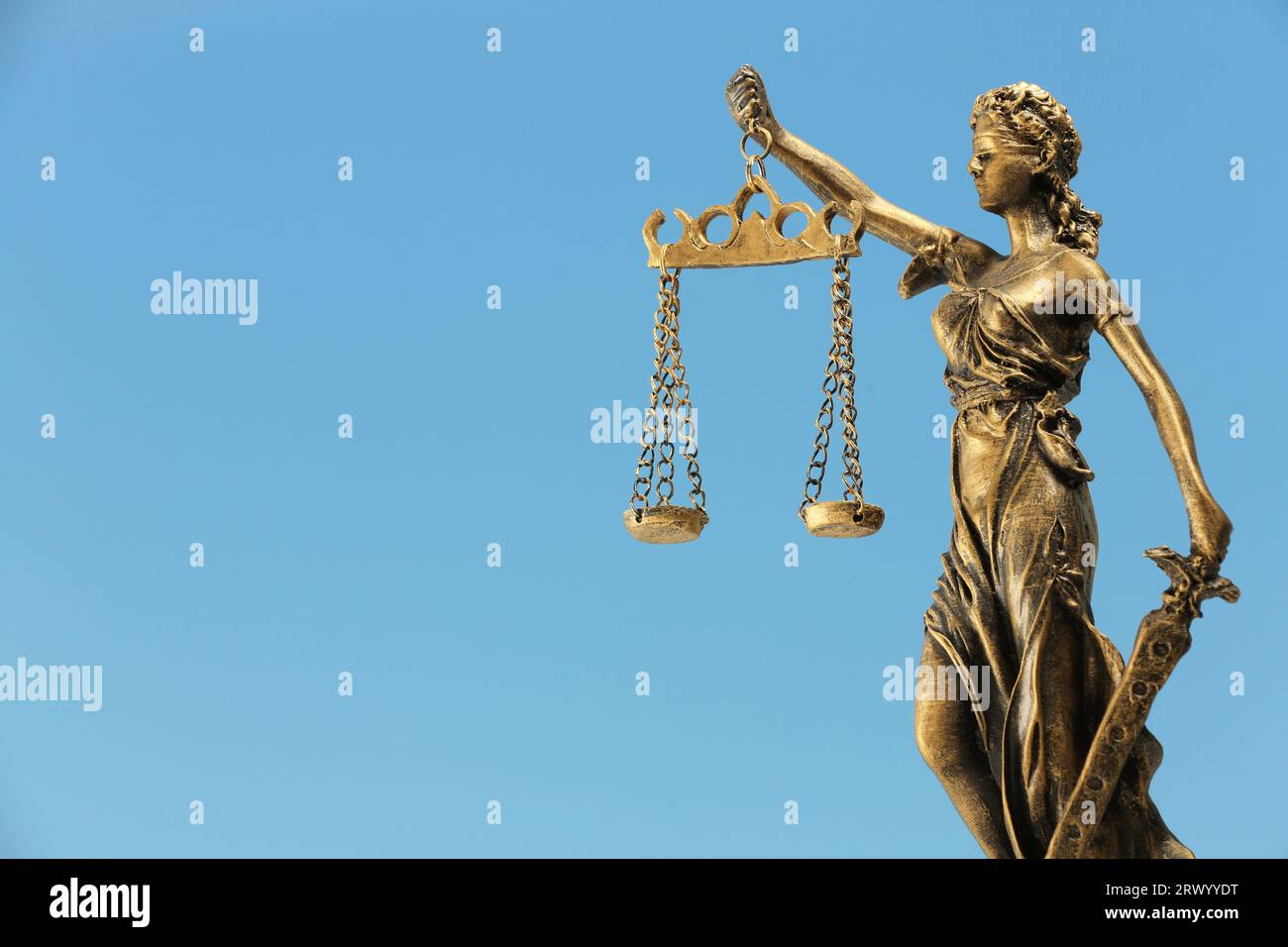 Figure of Lady Justice against sky, space for text. Symbol of fair ...