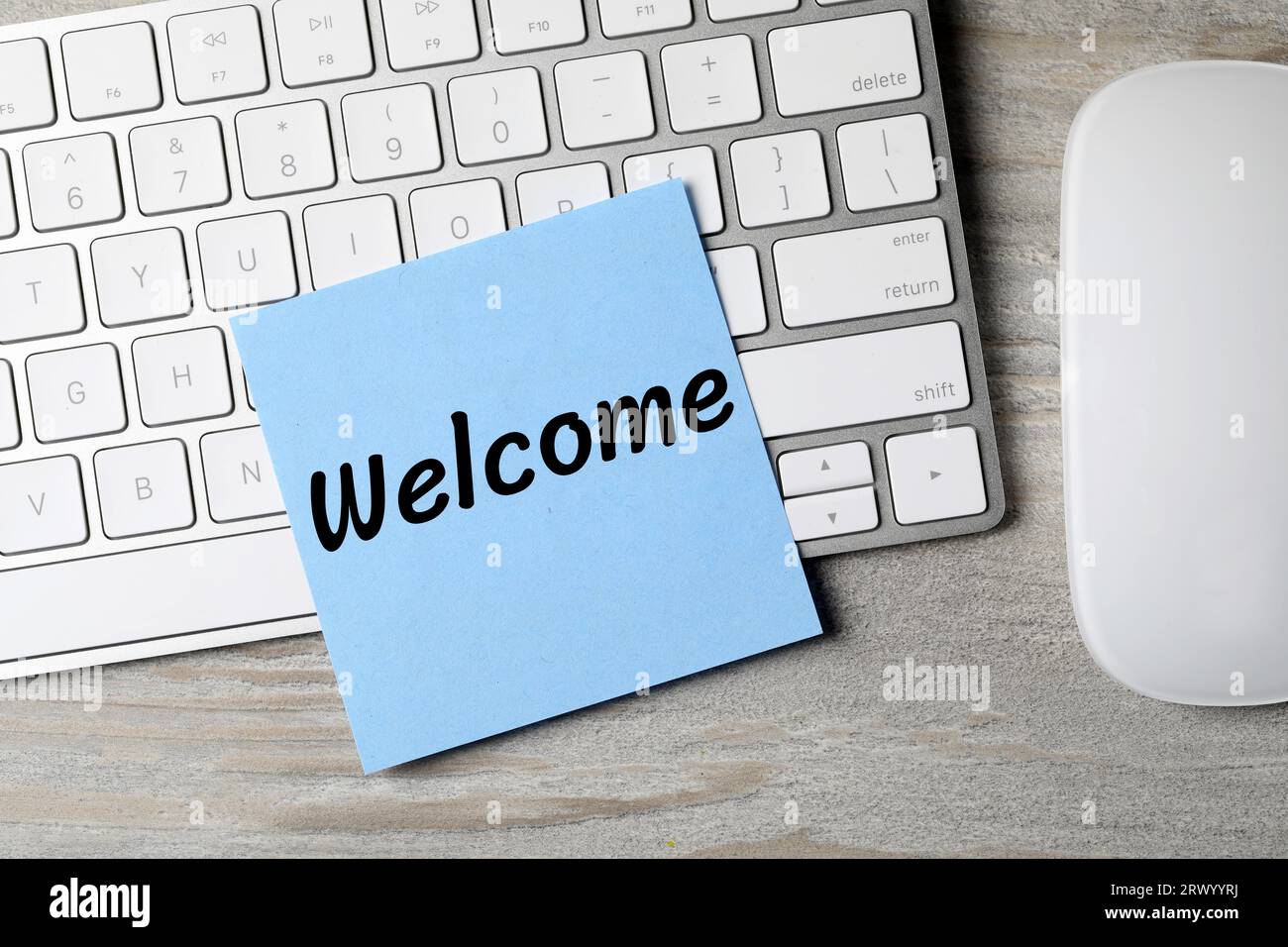 Welcome message on blue keyboard hi-res stock photography and images ...