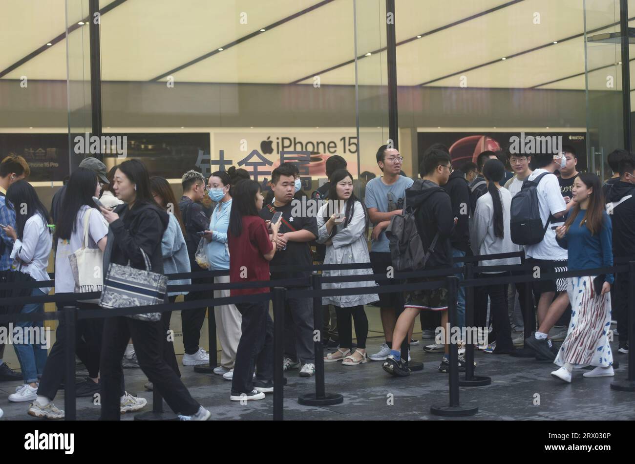 HANGZHOU, CHINA - SEPTEMBER 22, 2023 - Customers wait in line to buy ...