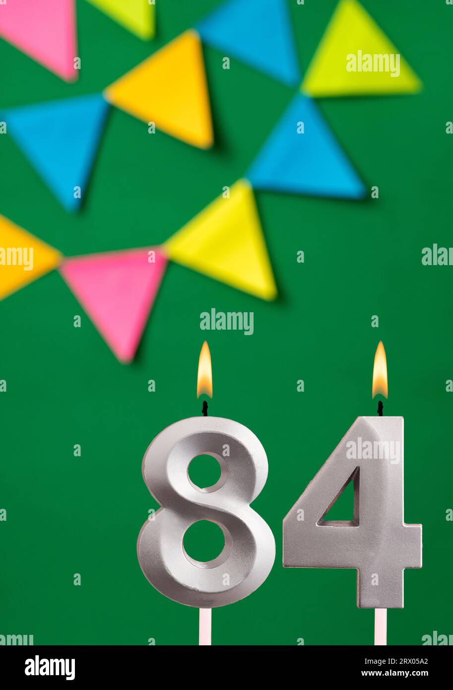 Vertical birthday card with number 84 candle - Green background with ...