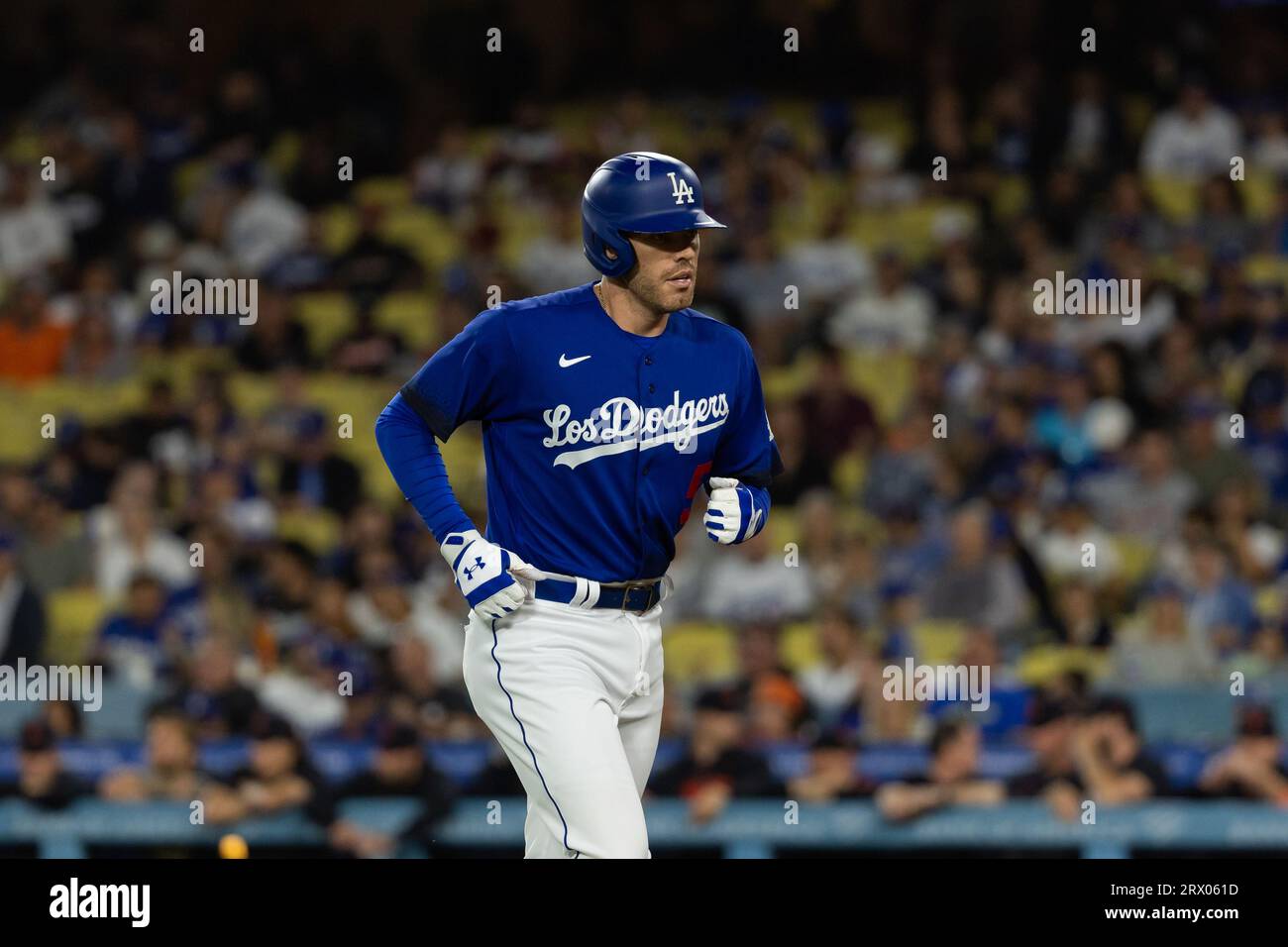 Los Angeles Dodgers first baseman Freddie Freeman (5) walks back to the ...