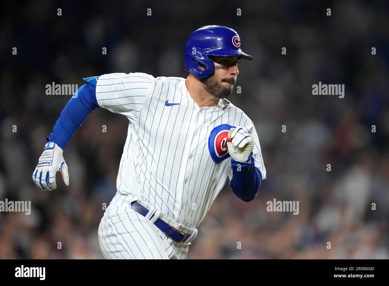 Chicago Cubs' Mike Tauchman runs after hitting an RBI double off ...