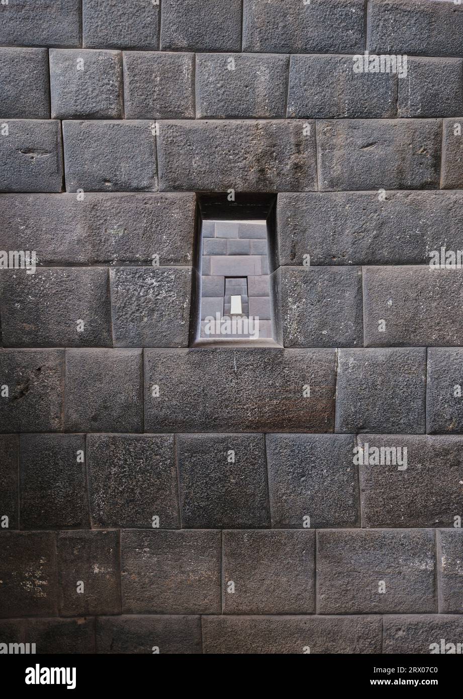 Cusco, Peru. 2023, Three aligned trapezoidal windows in an Inca wall ...