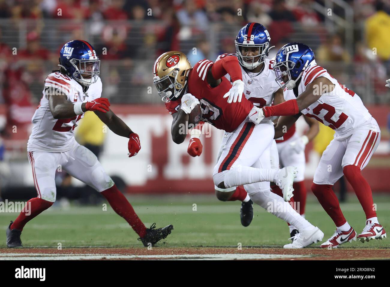 San Francisco 49ers wide receiver Deebo Samuel, middle, runs against ...