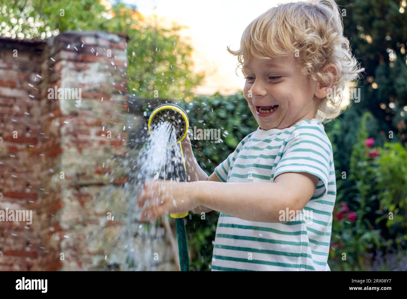 Showering boy hi-res stock photography and images - Alamy