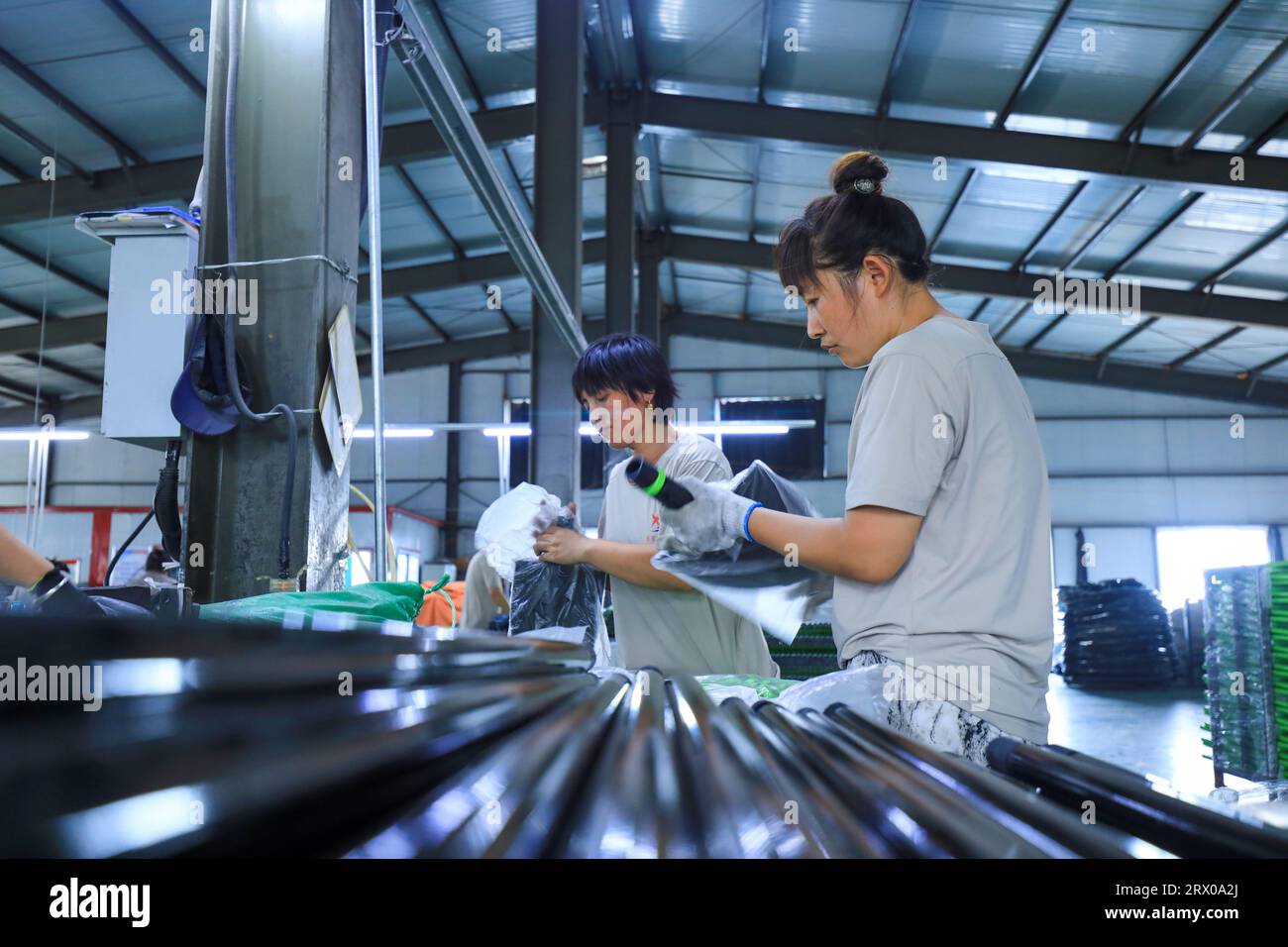 Luannan County, China - August 3, 2022: Workers are busy working on the ...