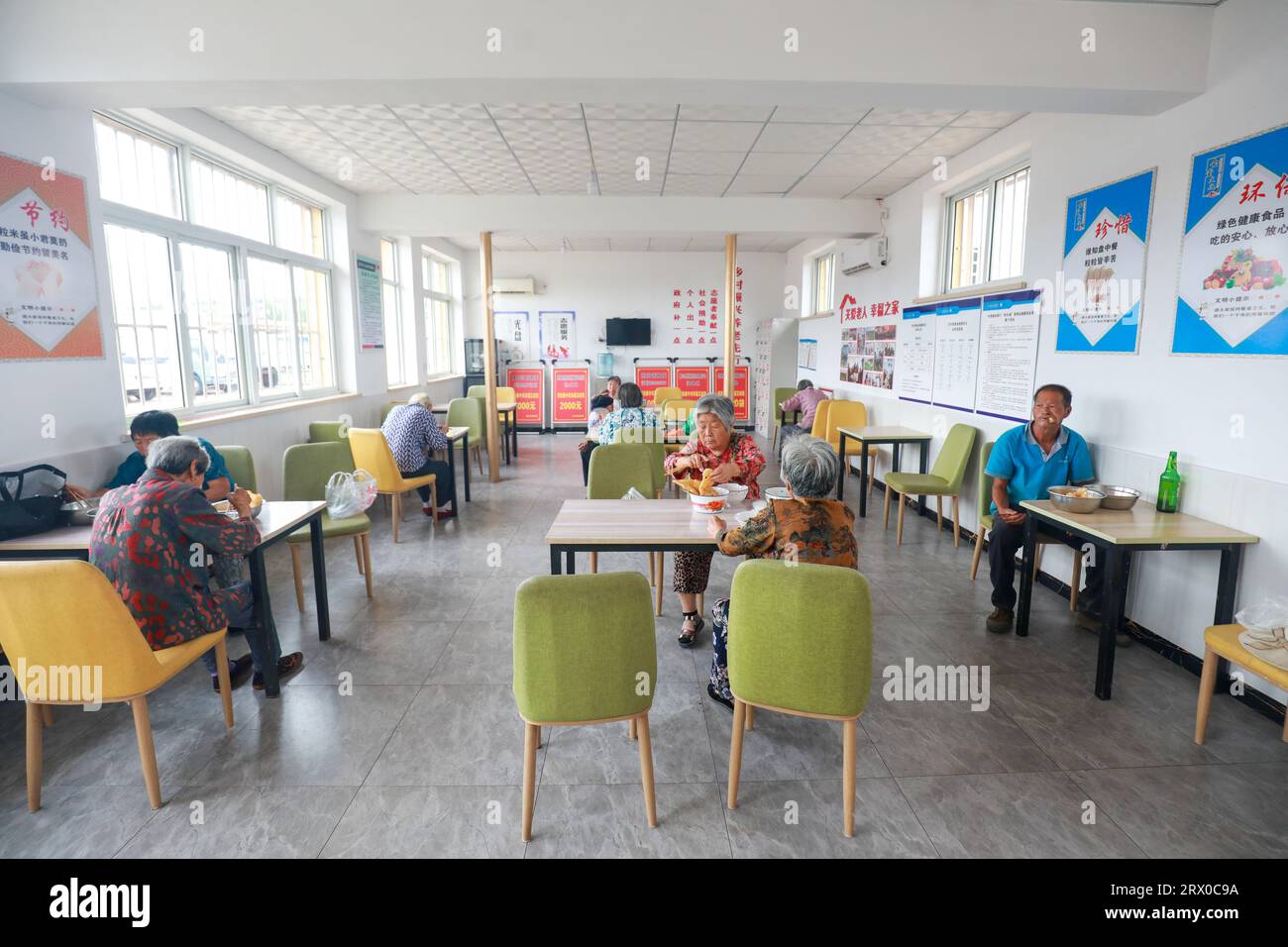 Luannan County, China - August 9, 2023: Elderly people living alone eat ...