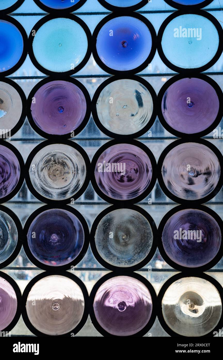 Close up photo of beautiful blue and purple circular glass window in ...