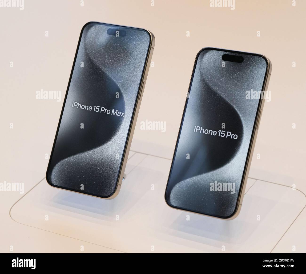 Photo taken on Sept. 22, 2023, shows iPhone 15 Pro (R) and iPhone 15 ...