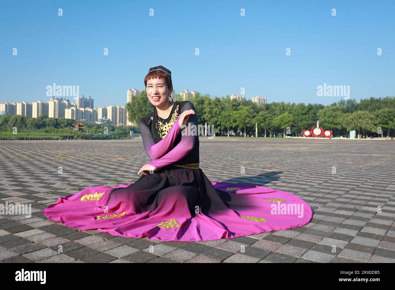Luannan County, China - August 10, 2023: Women practicing Xinjiang ...