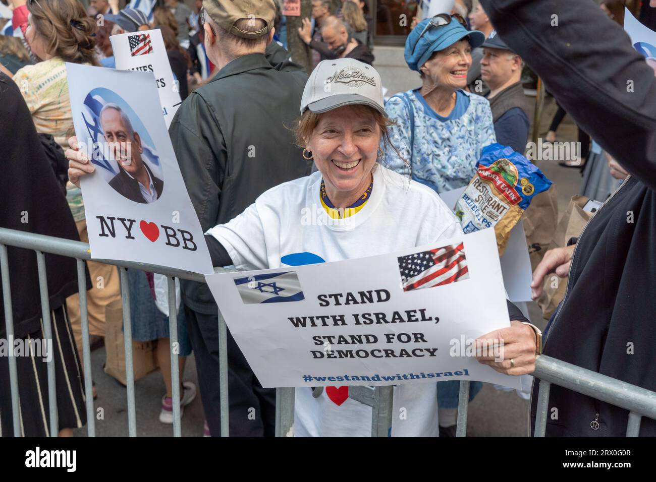 NEW YORK, NEW YORK - SEPTEMBER 21: A woman holds "NY [love] BB" and ...
