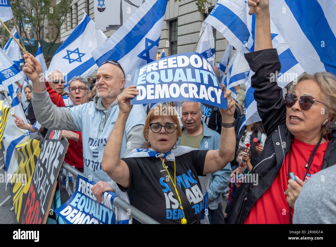 NEW YORK, NEW YORK - SEPTEMBER 21: A woman holds a "Freedom Equality ...
