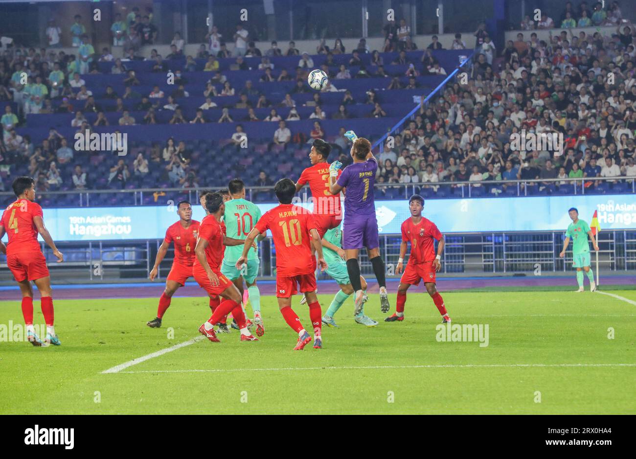 The men's football group match between China and Myanmar (RED) at the ...