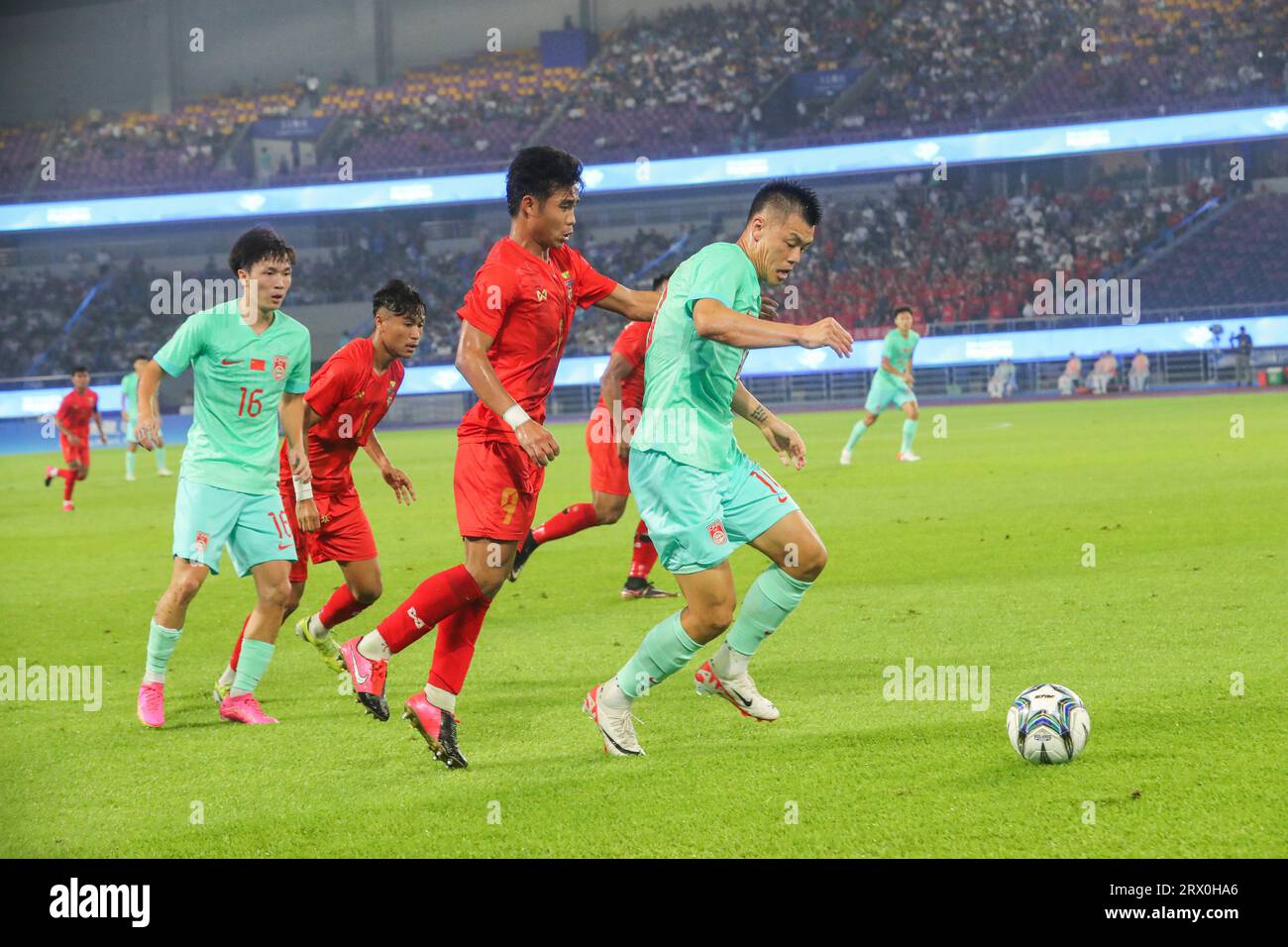 The men's football group match between China and Myanmar (RED) at the ...
