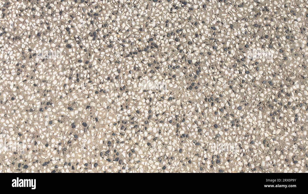 Seamless background from small gravel stone and concrete floor to ...