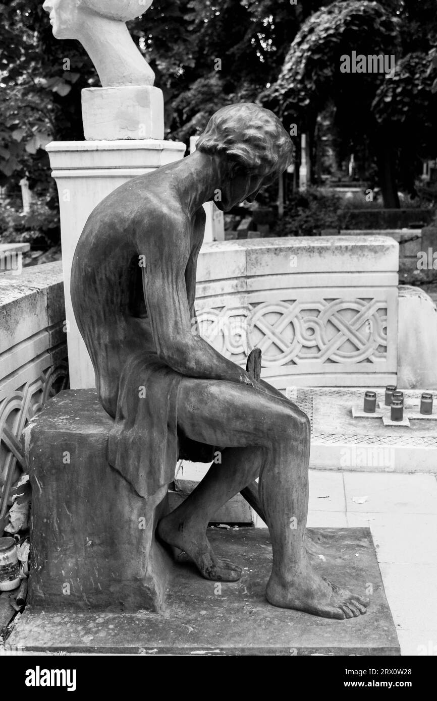 Boy in statue Black and White Stock Photos & Images - Alamy