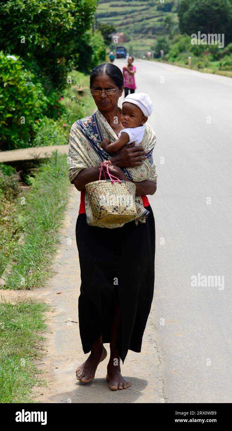 A Malagasy woman with her baby. Photo taken in central Madagascar Stock ...
