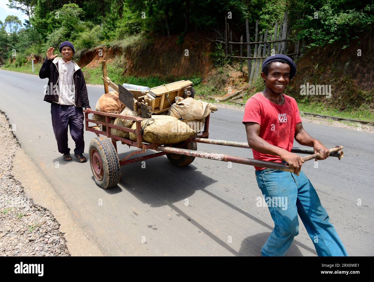 Man pulling cart hi-res stock photography and images - Alamy