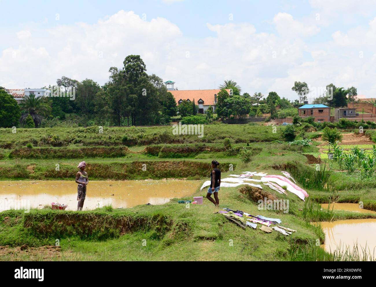 Women doing laundry village hi-res stock photography and images - Alamy