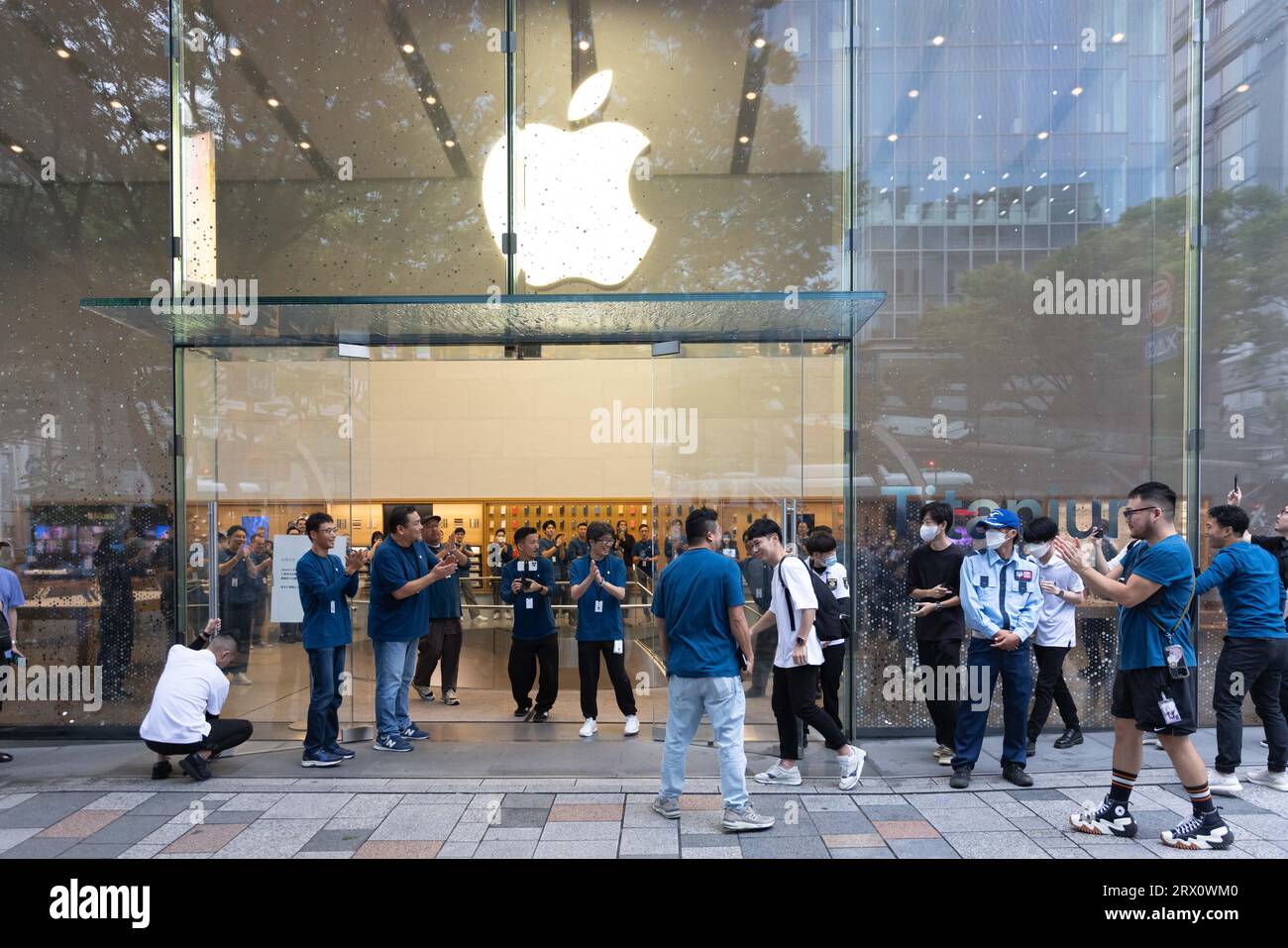 First customers walk into the Apple store in Omotesando, Tokyo on the ...