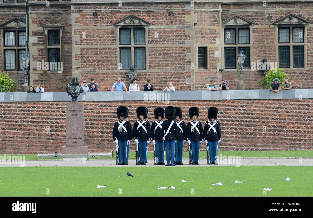 The Danish Royal Guard marching out from Rosenborg Castle towards the ...