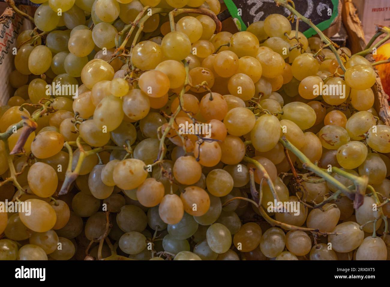 Close up of fresh yellow grapes. Yellow grapes in the market ...