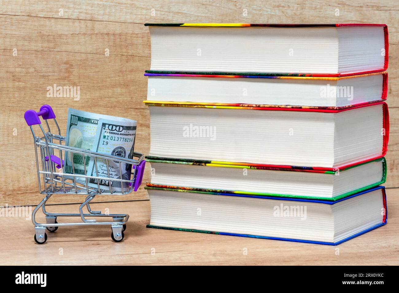 stack of books .Trolley. Concept of book trade, book business ...