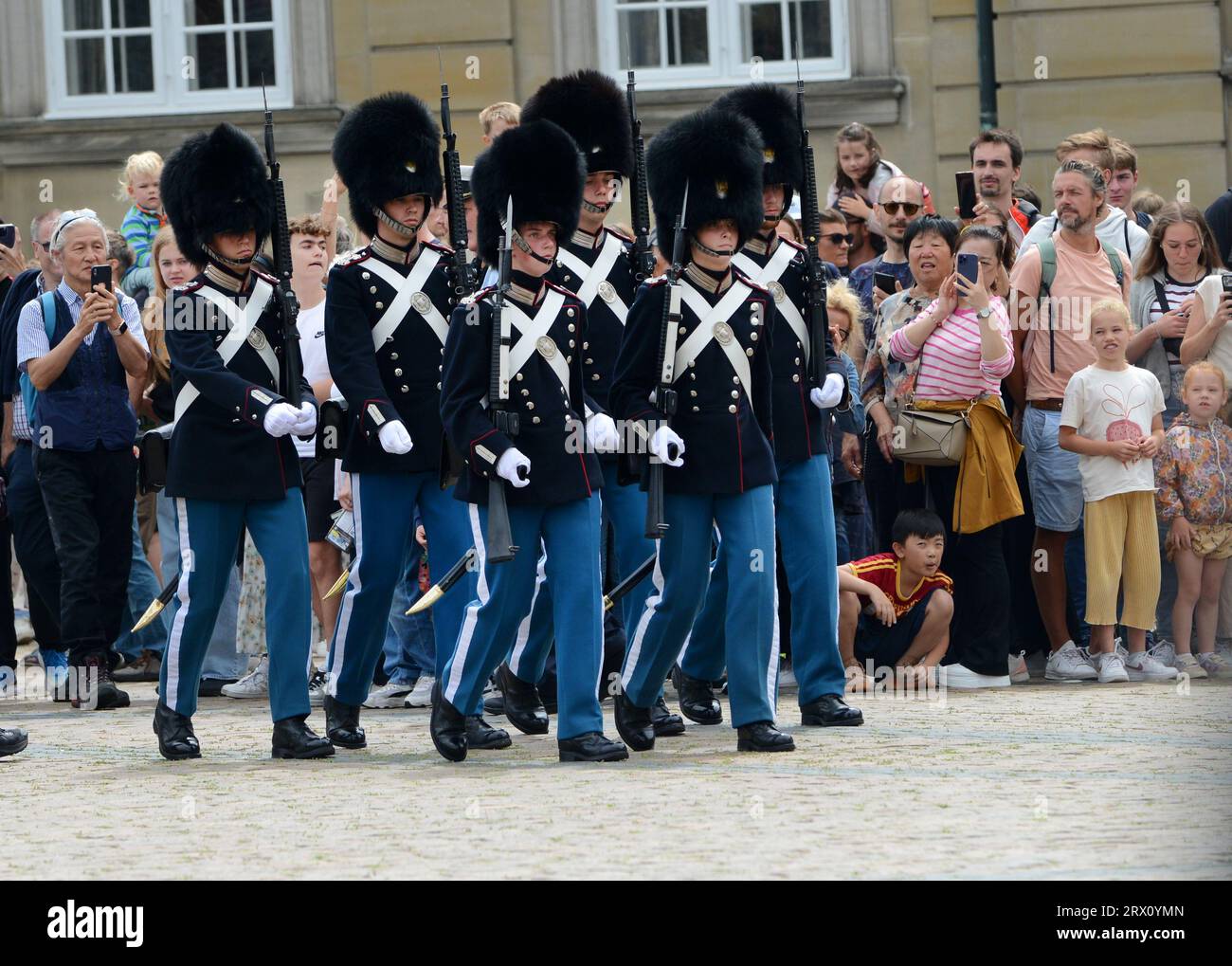 Change of the Royal Danish guard at Amalienborg castle in Copenhagen ...