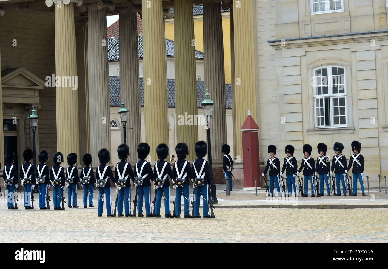 Change of the Royal Danish guard at Amalienborg castle in Copenhagen ...
