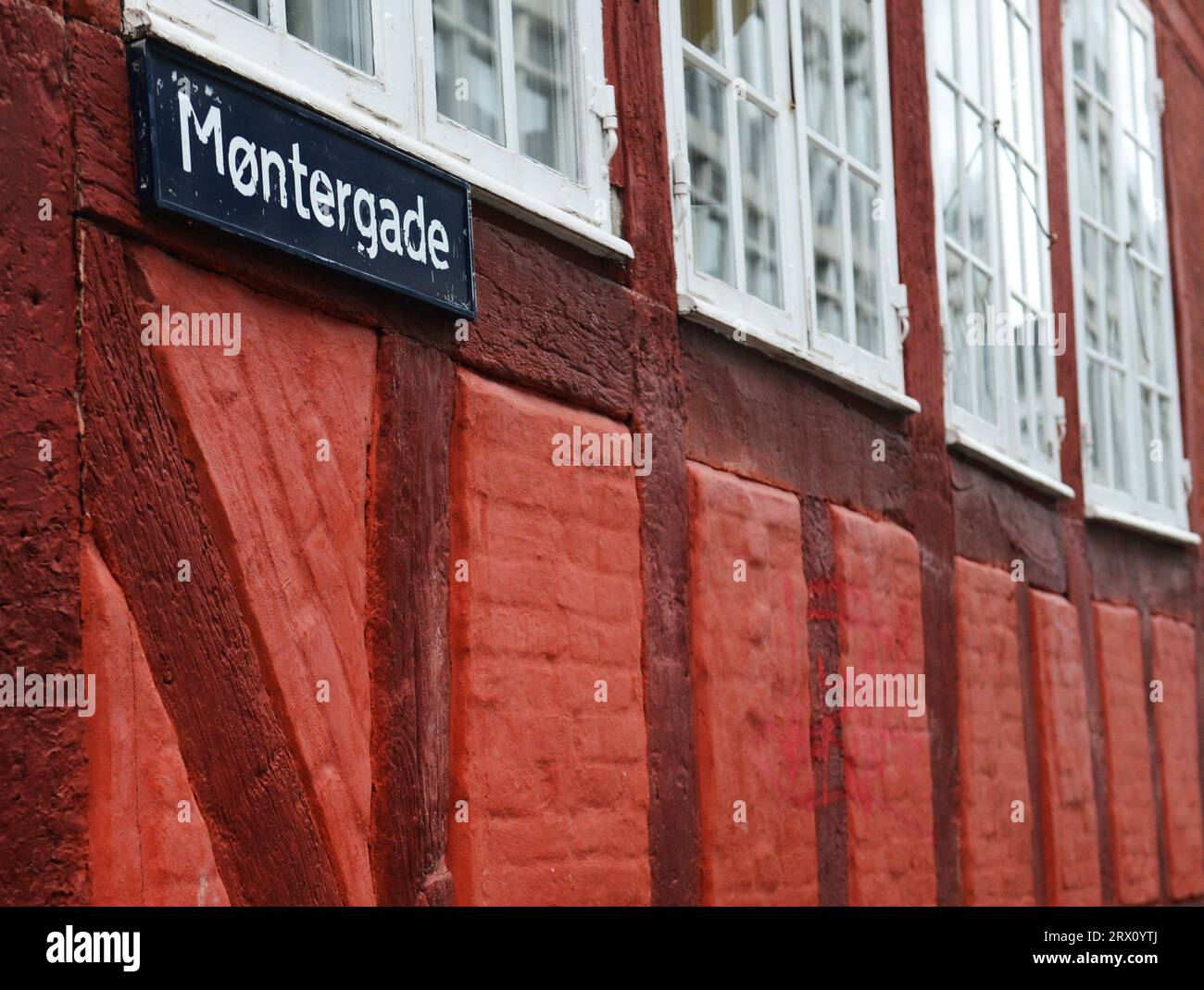 A colorful red building on Møntergade, Copenhagen, Denmark Stock Photo ...