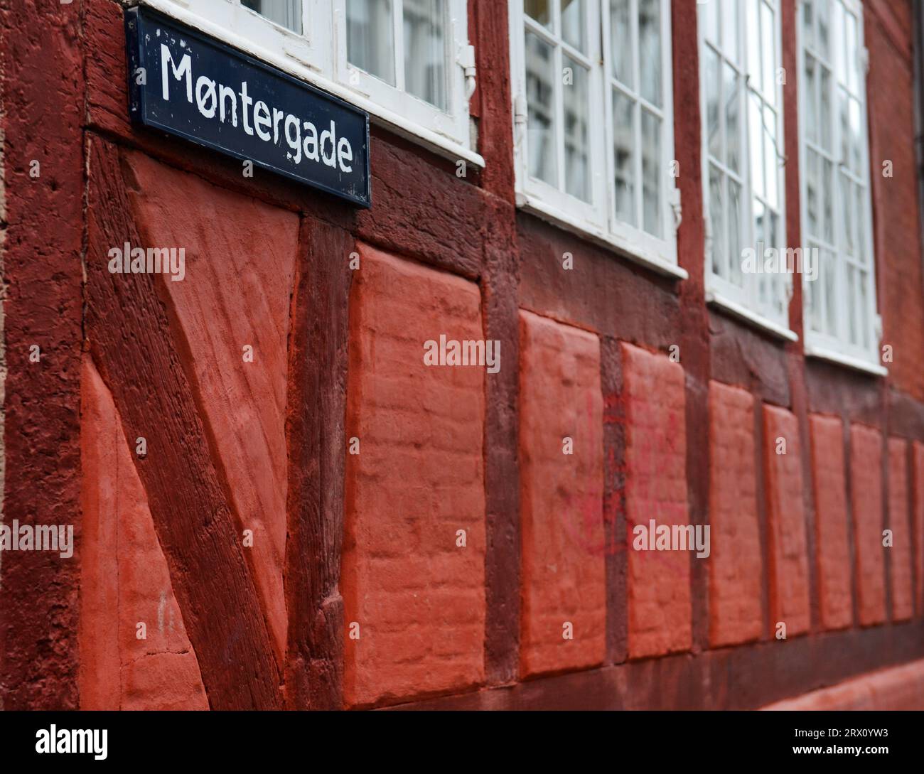 A colorful red building on Møntergade, Copenhagen, Denmark Stock Photo ...