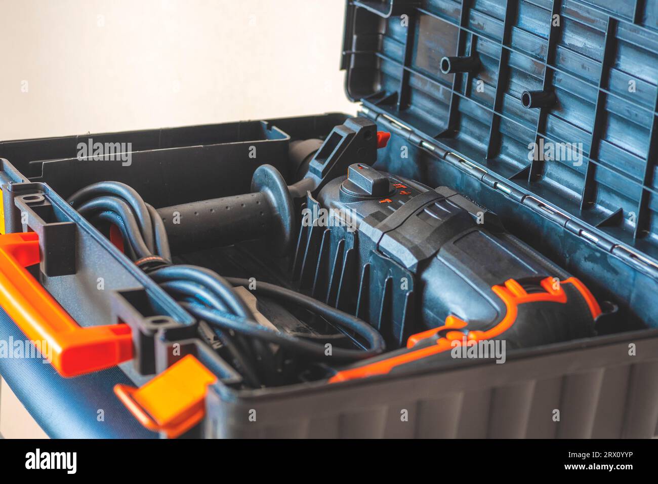 Hammer in a box close up. rotary hammer, rotary drill, perforator in a ...