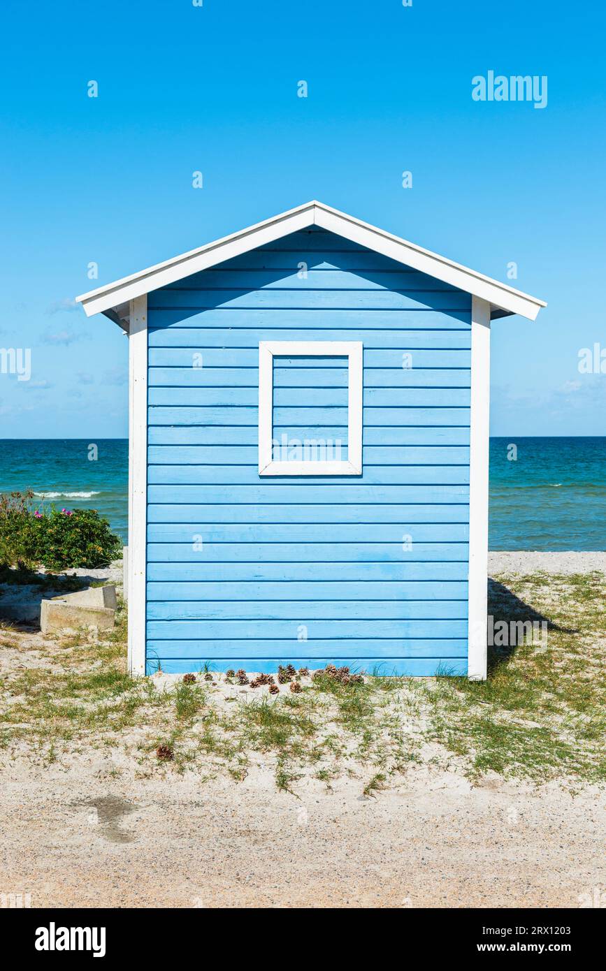 Frontal view of the back of a blue and white wooden bathing hut on the ...