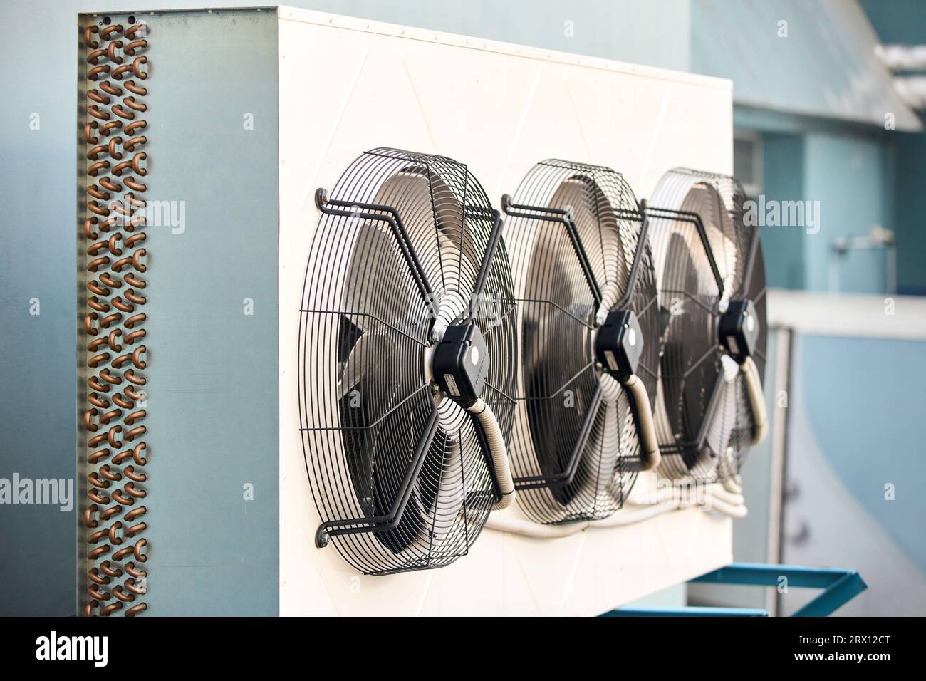 Air condition machine on commercial warehouse building wall side view ...