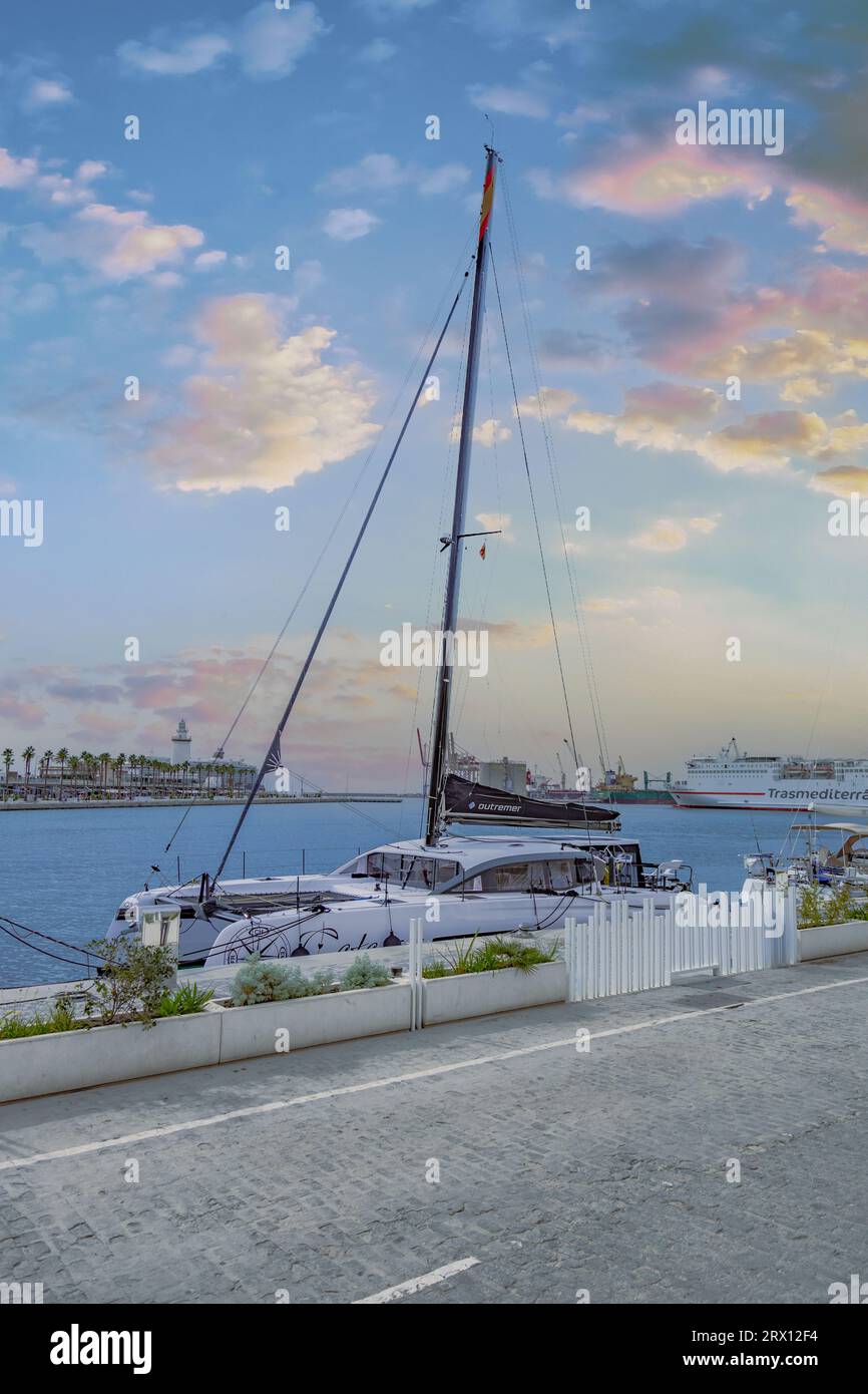 Amazing scenic view of the marina and the seaport of Malaga in the rays ...